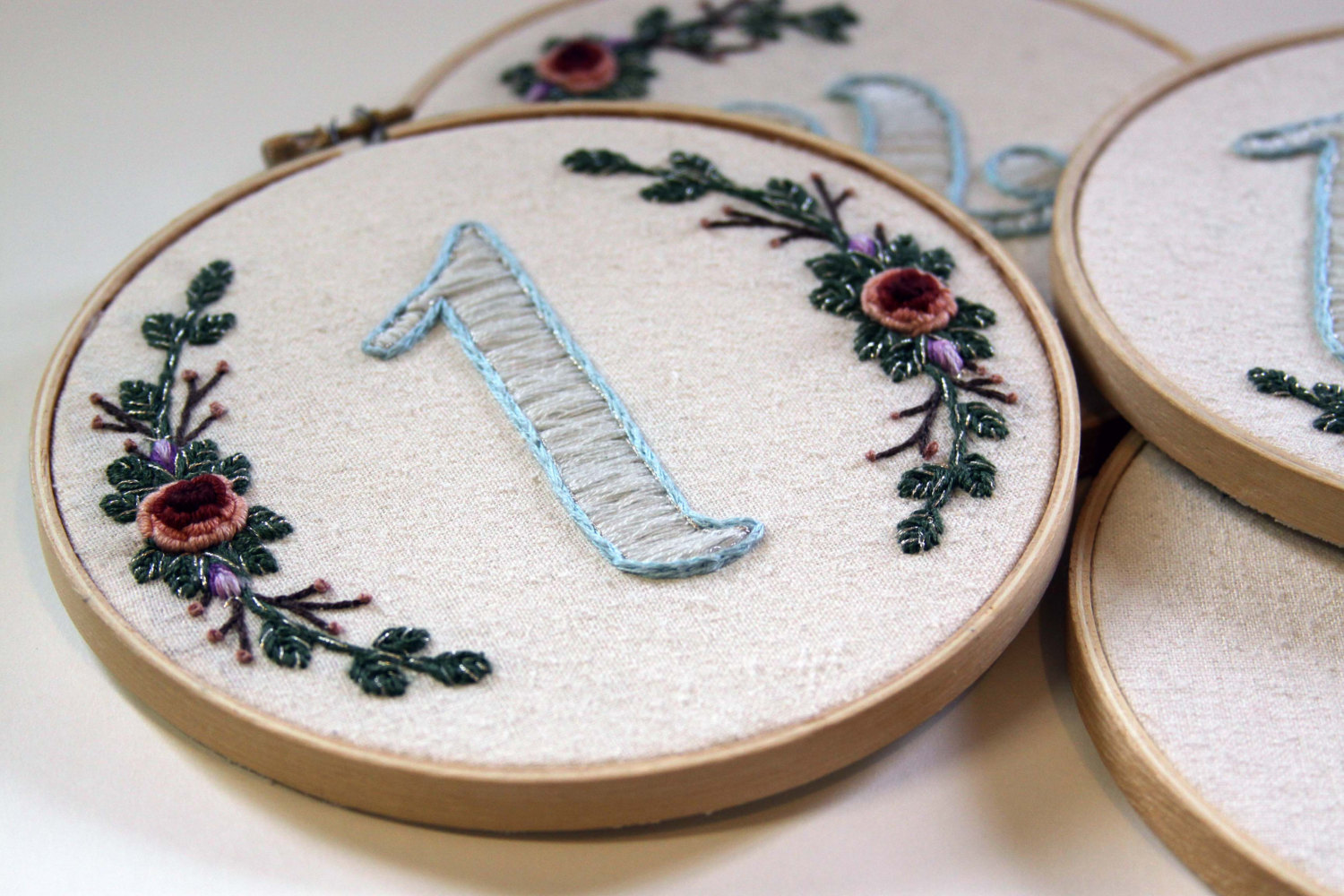 Fun + Creative Embroidery Hoop Table Numbers for Weddings