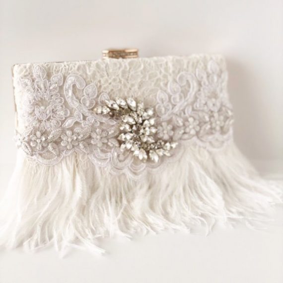 New: This is the Feather Clutch Purse You'll Love Happily Ever After